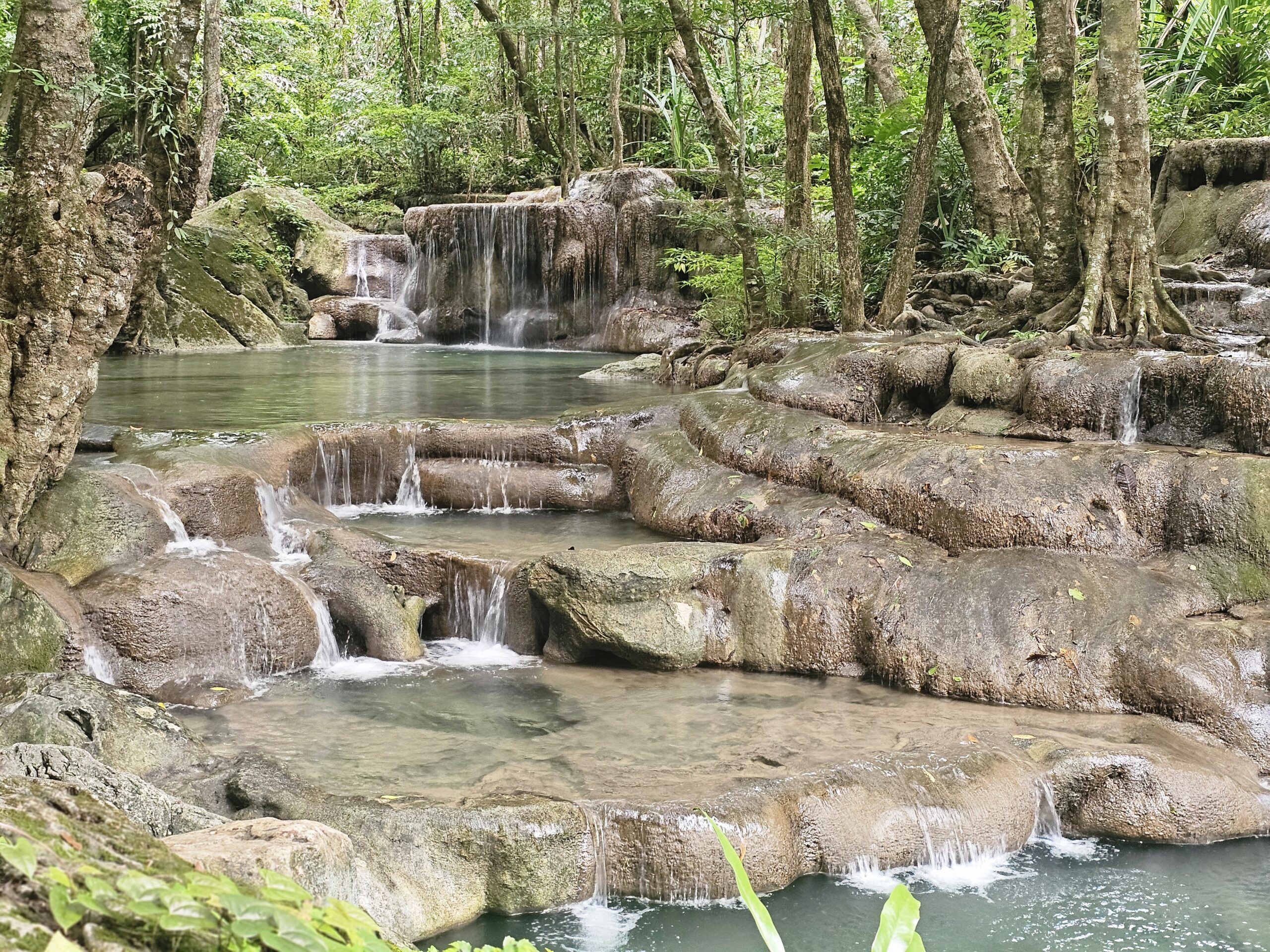 Discover the Magic of Erawan Waterfall! - PoppyFriendlyTrips - Thailand ...